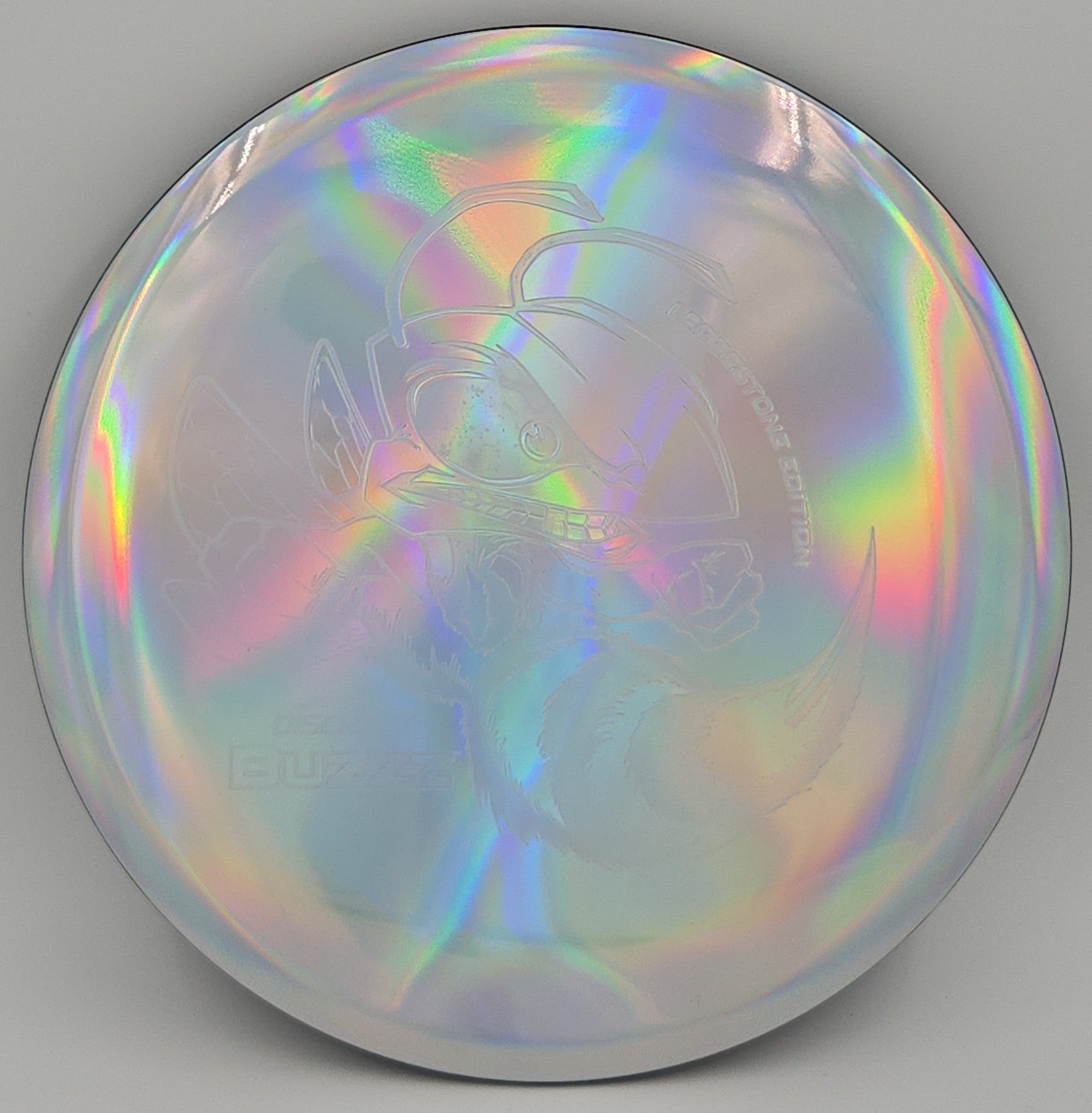 Discraft Ledgestone Full Foil Supercolor Buzzz 178g – All Seasons Disc Golf